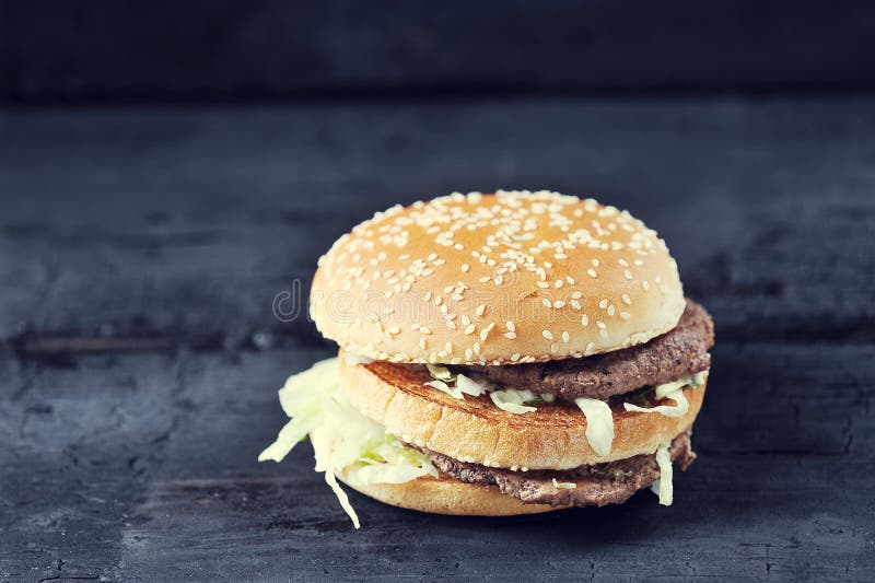 Beef Burger with Sesame Bun Close-up Stock Photo - Image of sandwich ...