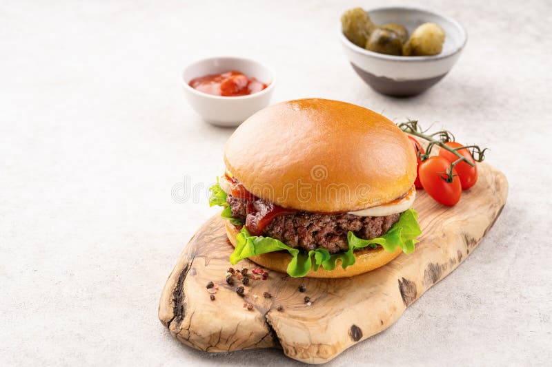 Beef Burger on Wooden Plate Stock Photo - Image of horizontal, copy ...
