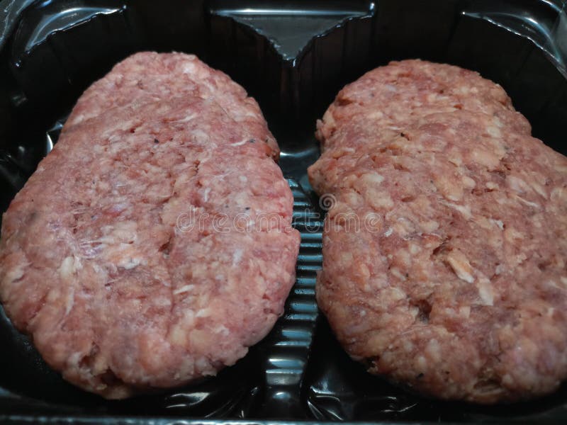 Beef Burgers in a Plastic Store Package Stock Photo - Image of package ...