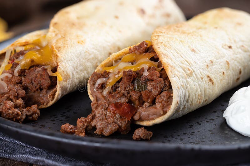 Beef Burrito with Refried Beans and Cheese Stock Photo - Image of ...