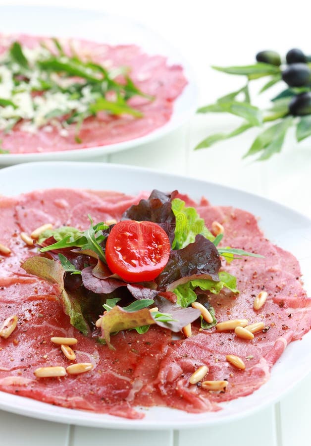 Beef Carpaccio with Arugula and Parmesan Stock Image - Image of arugula ...