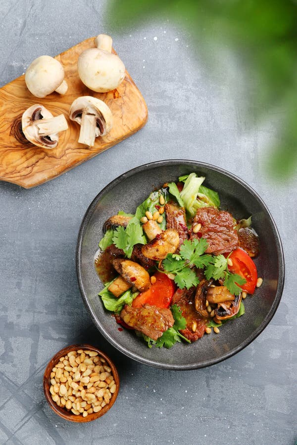 Beef and Champignons with Pine Nuts Top View. Beef and Mushrooms Salad ...
