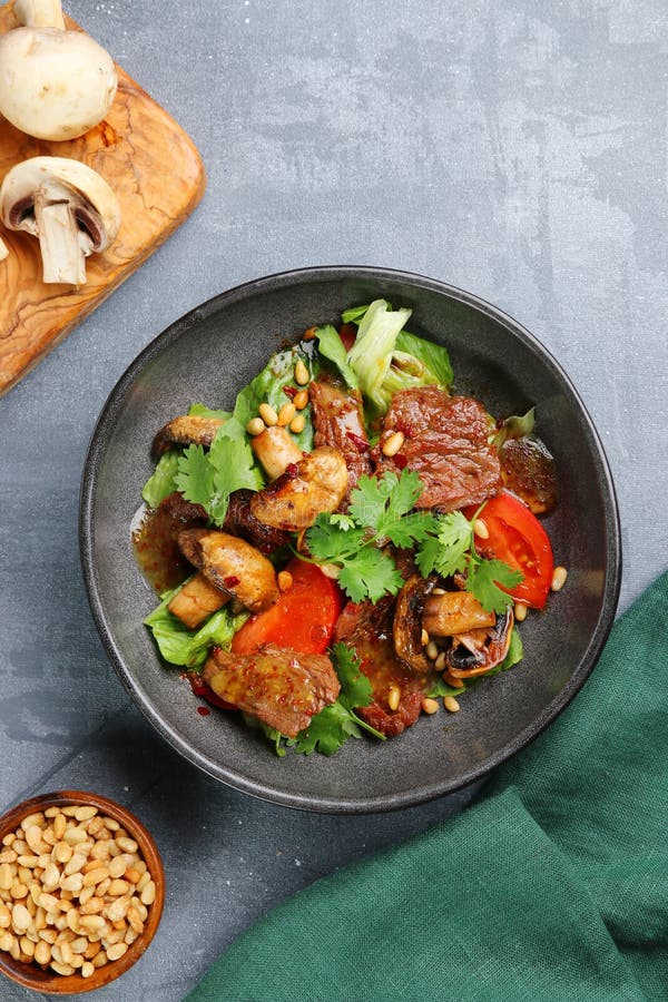 Beef and Champignons with Pine Nuts Top View. Beef and Mushrooms Salad ...