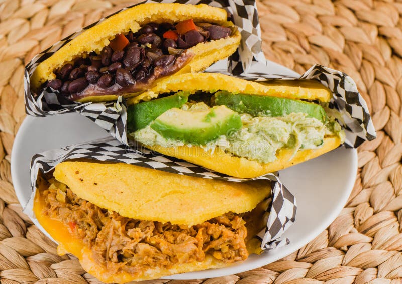 Assorted arepas on a plate stock photo. Image of dinner - 196150608