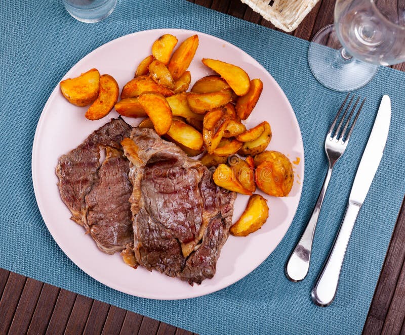 Beef Chop with Potatoes and Sauce Stock Image - Image of roasted, lunch ...