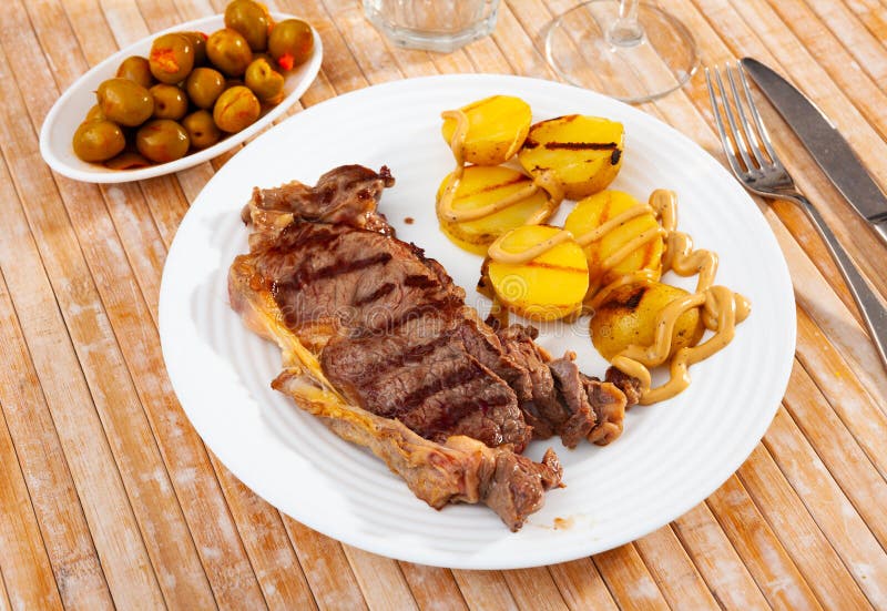 Beef Chop with Potatoes and Sauce Stock Image - Image of roasted, lunch ...
