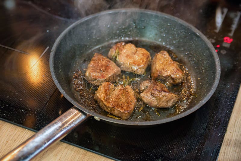 Beef cooked in frying pan stock photo. Image of fillet - 108711078