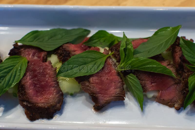 Medium Rare Beef stock photo. Image of gourmet, meal - 129699956