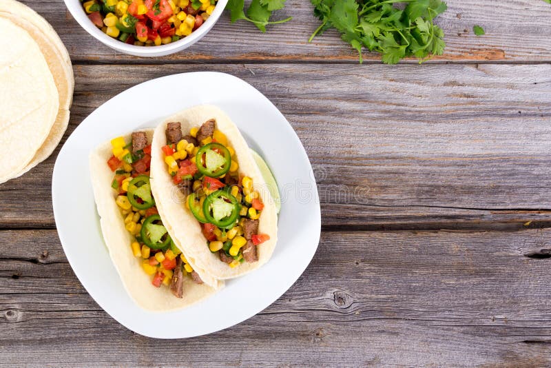 Beef Corn Soft Taco on Rustic Wood Table Stock Photo - Image of ...