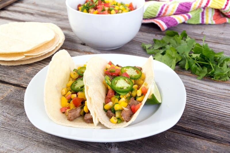 Beef Corn Soft Taco on Rustic Wood Table Stock Photo - Image of ...