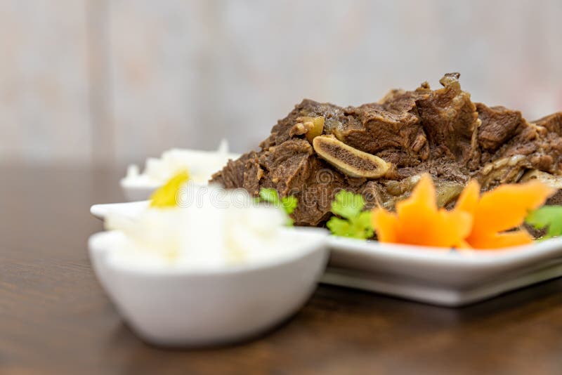 The Beef Dish is in Plate on Wooden Table Stock Photo - Image of ...