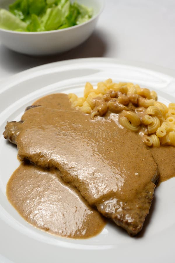 Beef Escalope or Rindsschnitzel with Sour Cream Sauce Stock Image ...