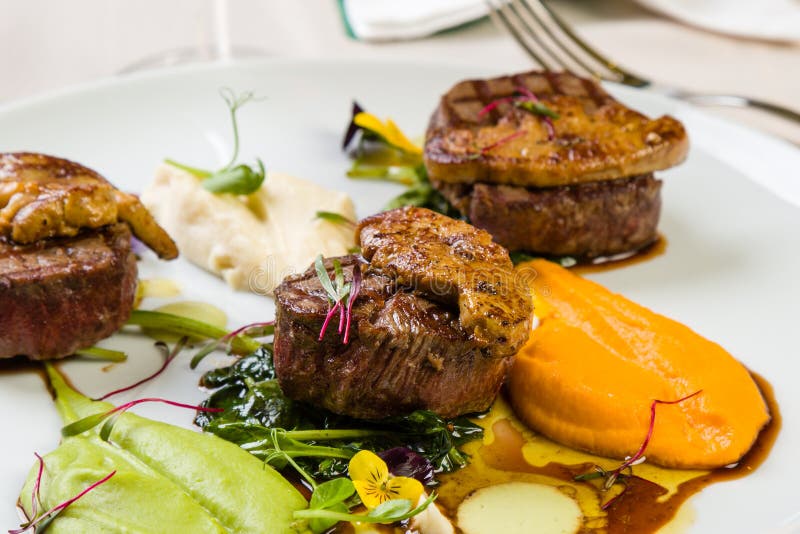 Beef filets with foie gras stock photo. Image of goose - 104837424