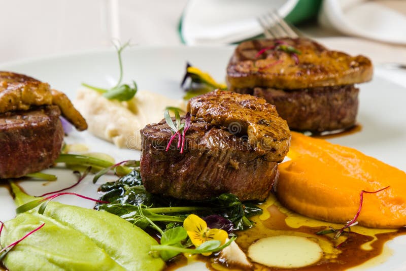 Beef filets with foie gras stock image. Image of filet - 104837473
