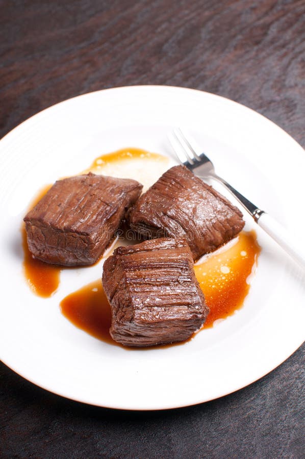 Beef Flank Steak Pieces Marinated and Cooked Stock Photo - Image of ...