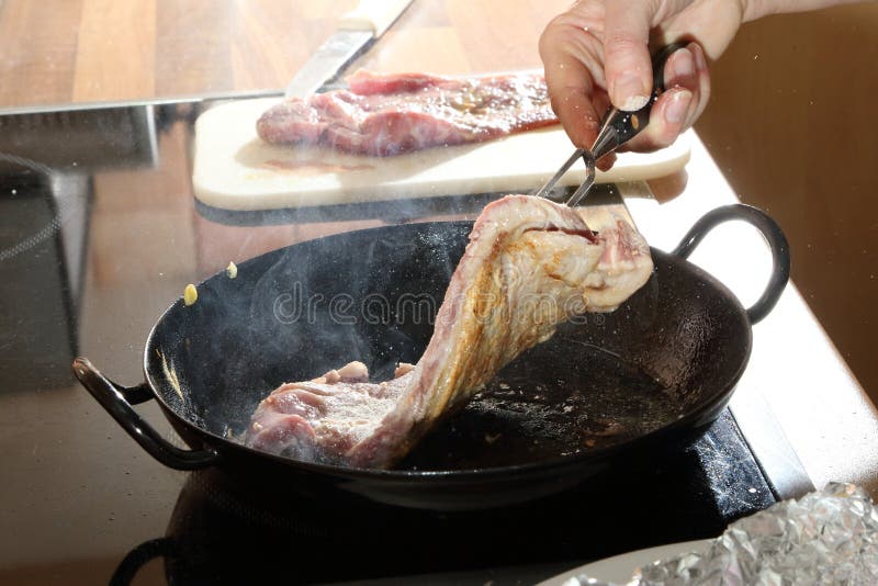 Beef with Flour Frying in Pan Stock Image - Image of frying, turning ...