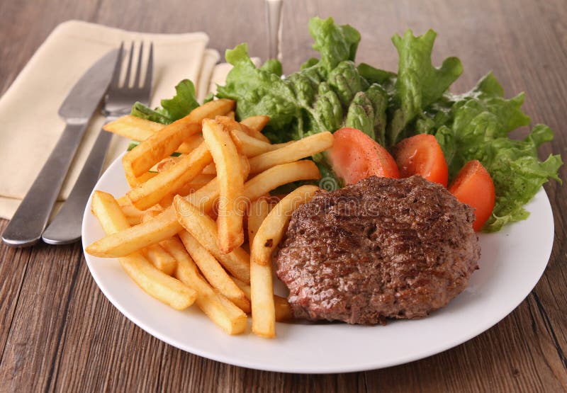 Restaurant Food - Beef Grilled Steak with French Fries Stock Photo ...