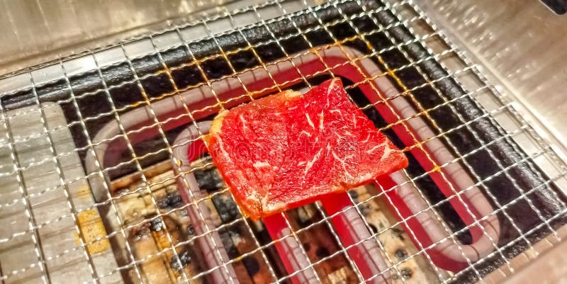 Beef Grilled on Rack in Japanese Style in Restaurant Stock Image ...