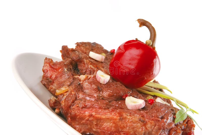 Beef Meat Chunk on Grey Dish Stock Photo - Image of garlic, food: 12033562