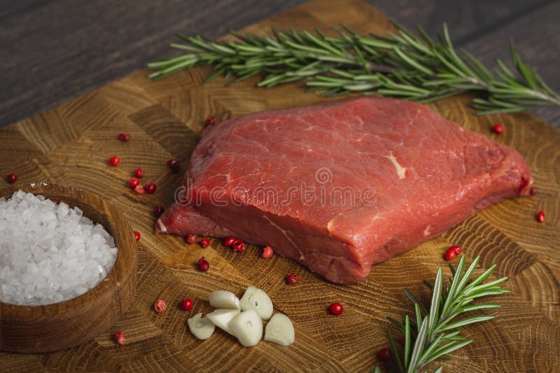 Beef Meat Close -up with Rosemary, Garlic and Salt Stock Image - Image ...