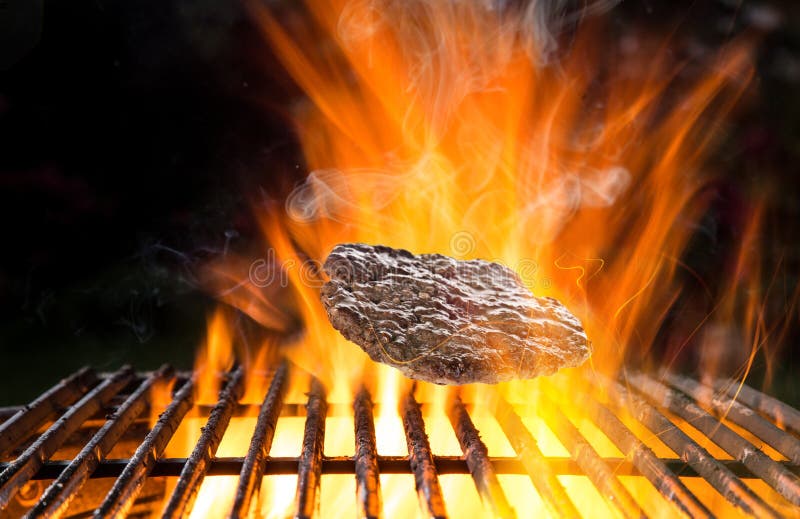 Beef meat on the grill. stock photo. Image of burn, meal - 65211926