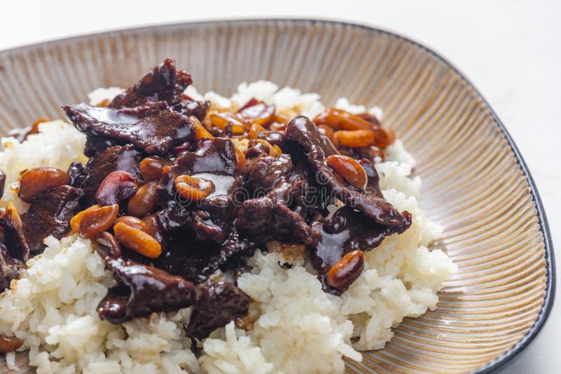 Beef Meat with Soya Sauce and Peanuts Served with White Rice Stock ...