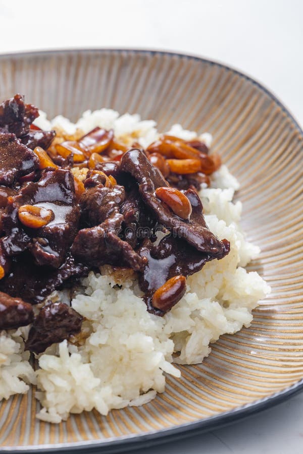 Beef Meat with Soya Sauce and Peanuts Served with White Rice Stock ...