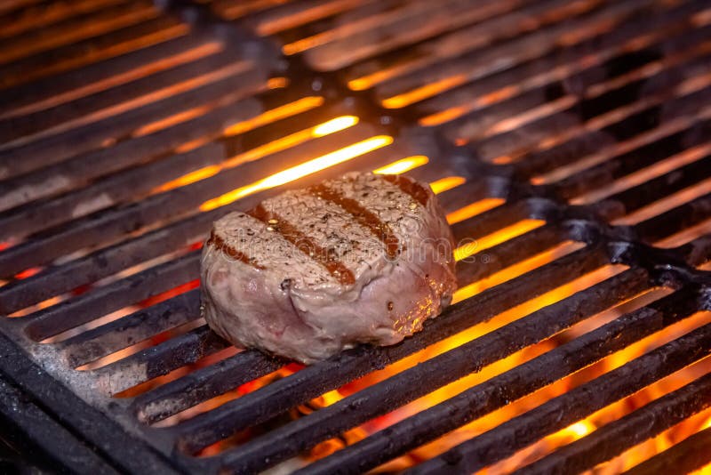 Beef Minion Steak is Fried on a Charcoal Grill Stock Photo - Image of ...