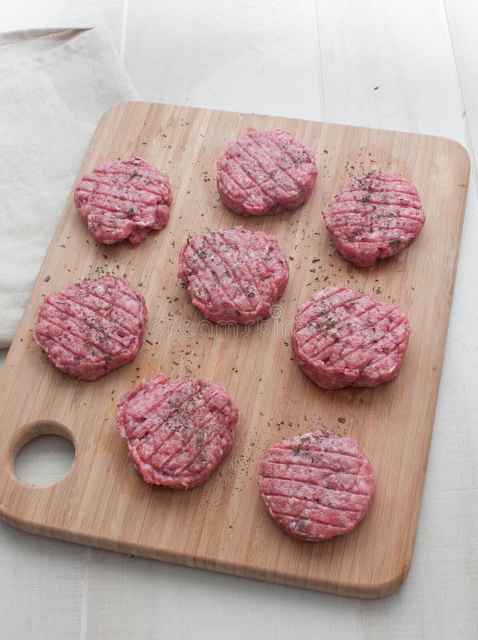 Beef Patties Round on Cutting Board Top View Stock Photo - Image of ...