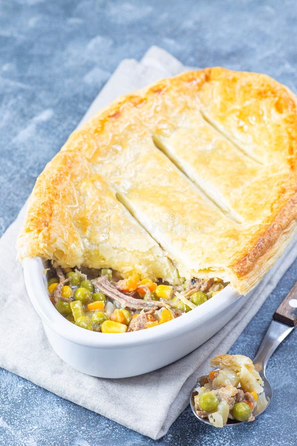 Beef Pot Pie or Deep Dish Pie in Baking Dish, Crust Broken Open ...