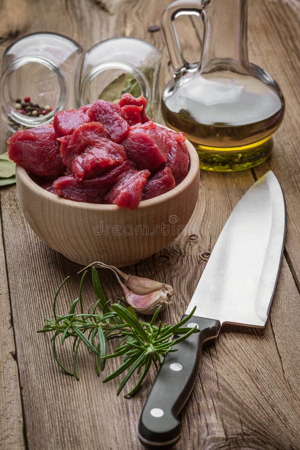 Raw Beef Diced with Rosemary Sprig in Vacuum-sealed Package Stock Image ...