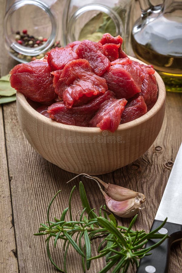 Raw Beef Diced with Rosemary Sprig in Vacuum-sealed Package Stock Image ...
