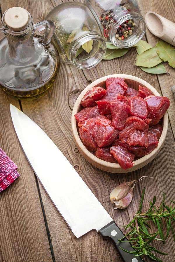 Raw Beef Diced with Rosemary Sprig in Vacuum-sealed Package Stock Image ...