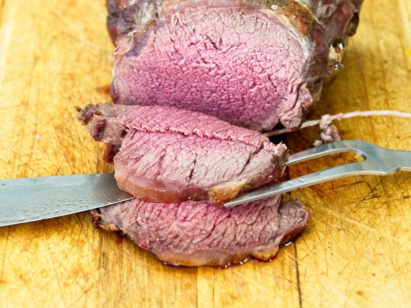 Beef Roast Cooked To Medium-rare on the Cutting Board Stock Image ...