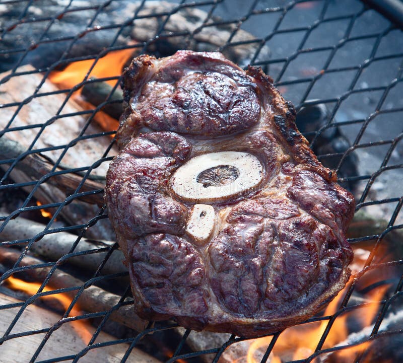 Beef Shank Roasted on a Grill Stock Photo - Image of protein, burn ...