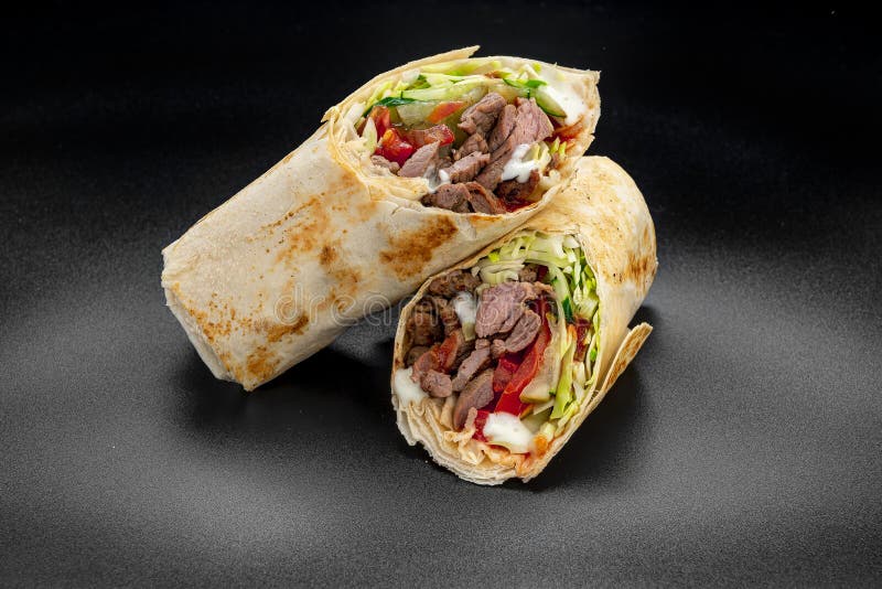 Beef Shawarma with French Fries Served in a Cutting Board Isolated on ...