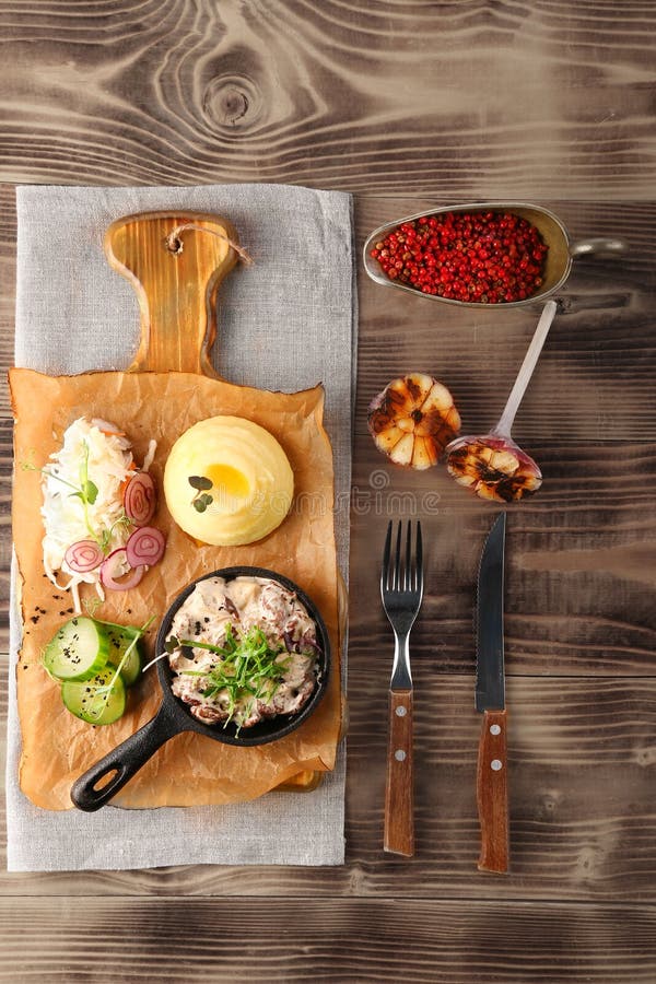 Beef with Sour Cream and Mashed Potato on Wooden Deck Top View Stock ...