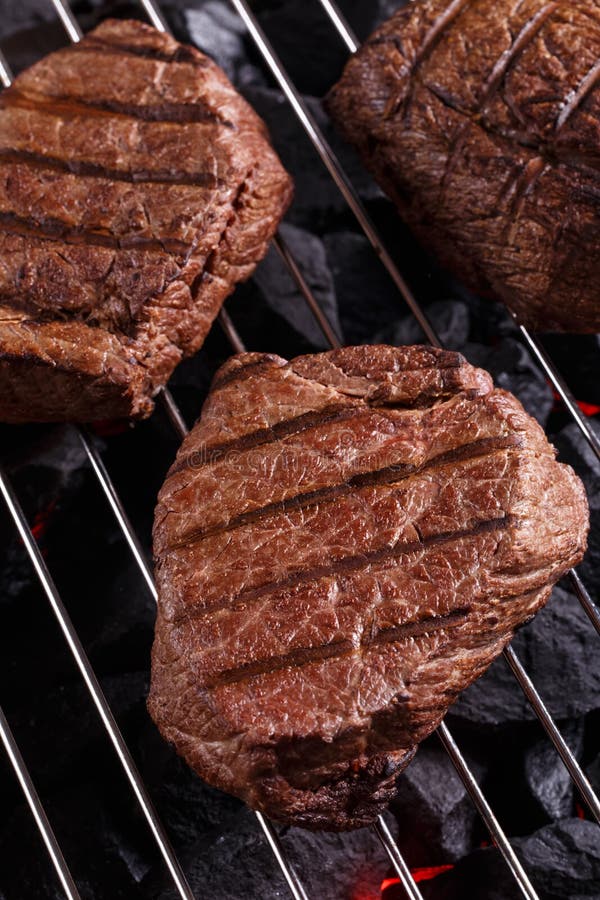 Beef Steak on a Barbecue Grill Stock Image - Image of board, fire: 40991483