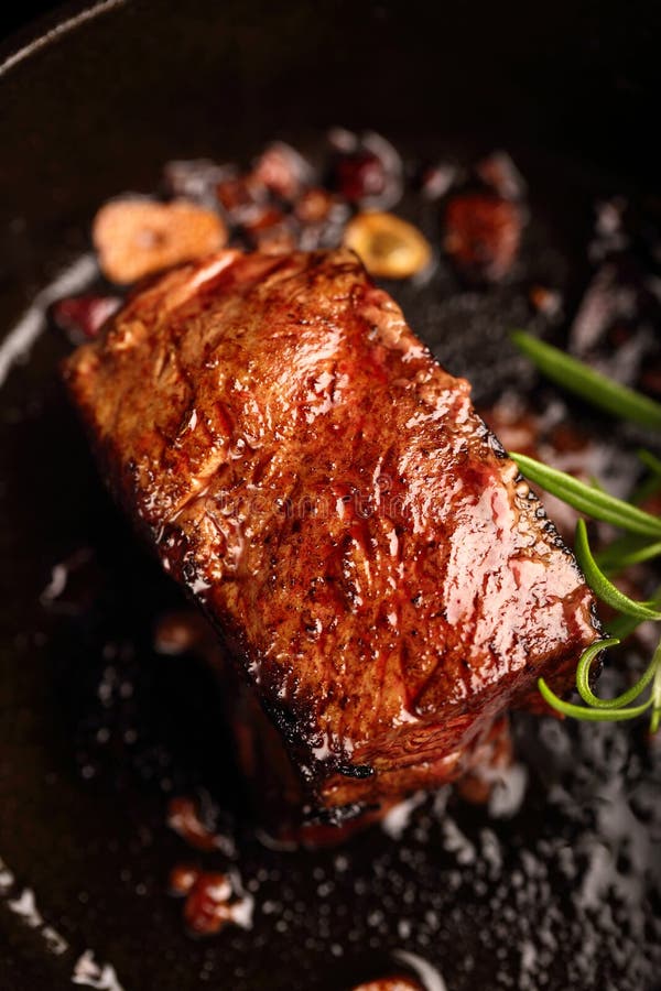 Beef Steak on Cast Iron Skillet Stock Image - Image of background ...