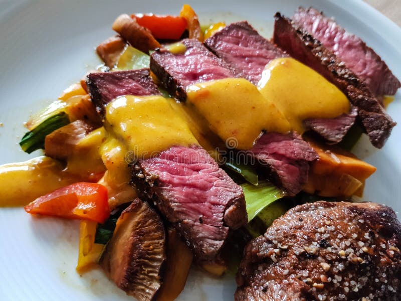 Beef steak fillet stock image. Image of onions, food - 258722621