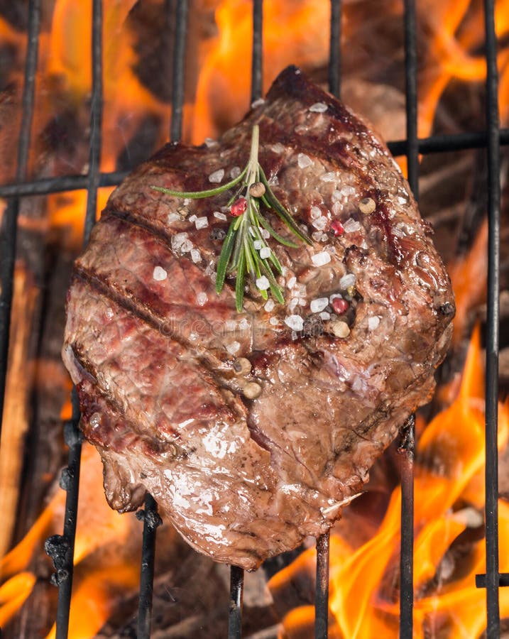 Beef steak on grill stock photo. Image of burn, steak - 54295002