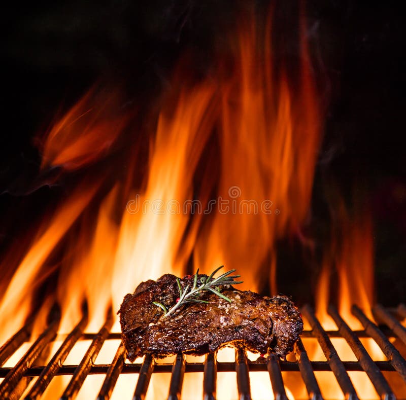 Beef Steak on the Grill with Flames Stock Photo - Image of charcoal ...