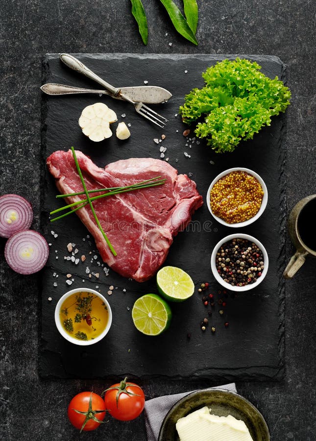Beef steak and ingredients stock photo. Image of indoors - 104790224