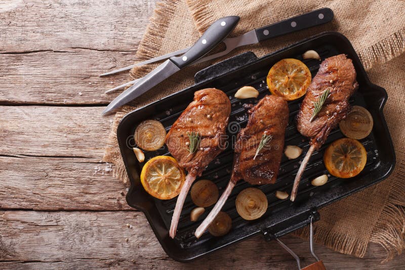 Beef Steak with Lemon on a Grill Pan. Horizontal Top View Stock Image ...