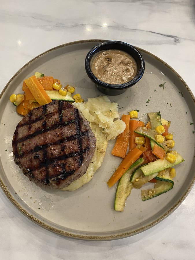 Beef Steak with Medium Rare is Served on a Beautiful Plate Stock Photo ...