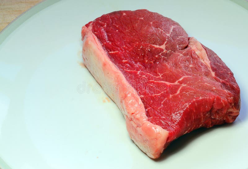 Beef steak on a plate. stock photo. Image of plate, marbled - 39455696