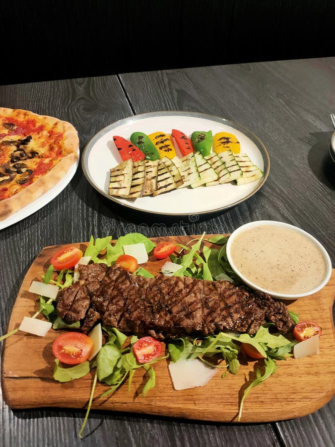 Beef Steak Salad Grilled Veggies and Pizza Stock Photo - Image of ...