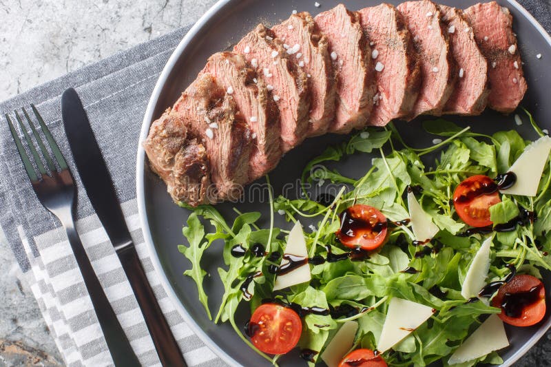 Beef Steak Tagliata with Arugula, Parmesan, Cherry Tomatoes and ...
