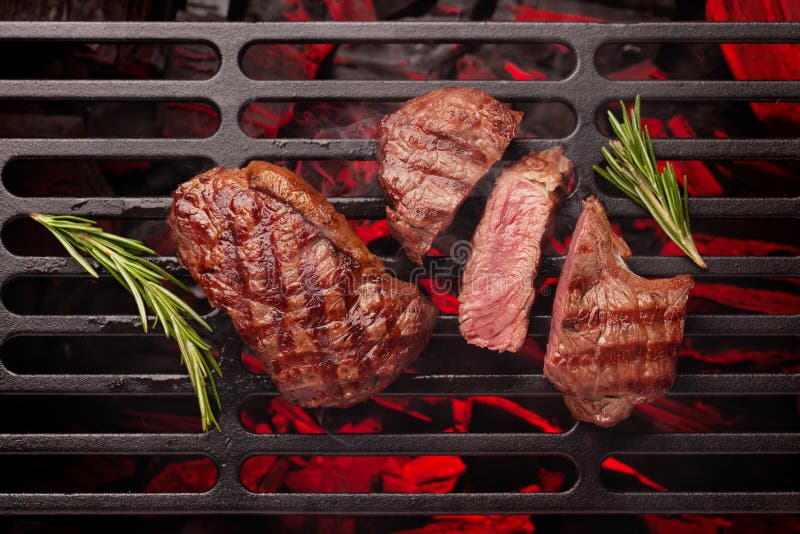 Beef Steaks Cooking on Grill Stock Photo - Image of porterhouse ...