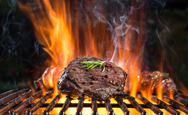 Beef Steaks on the Grill with Flames Stock Image - Image of fire ...